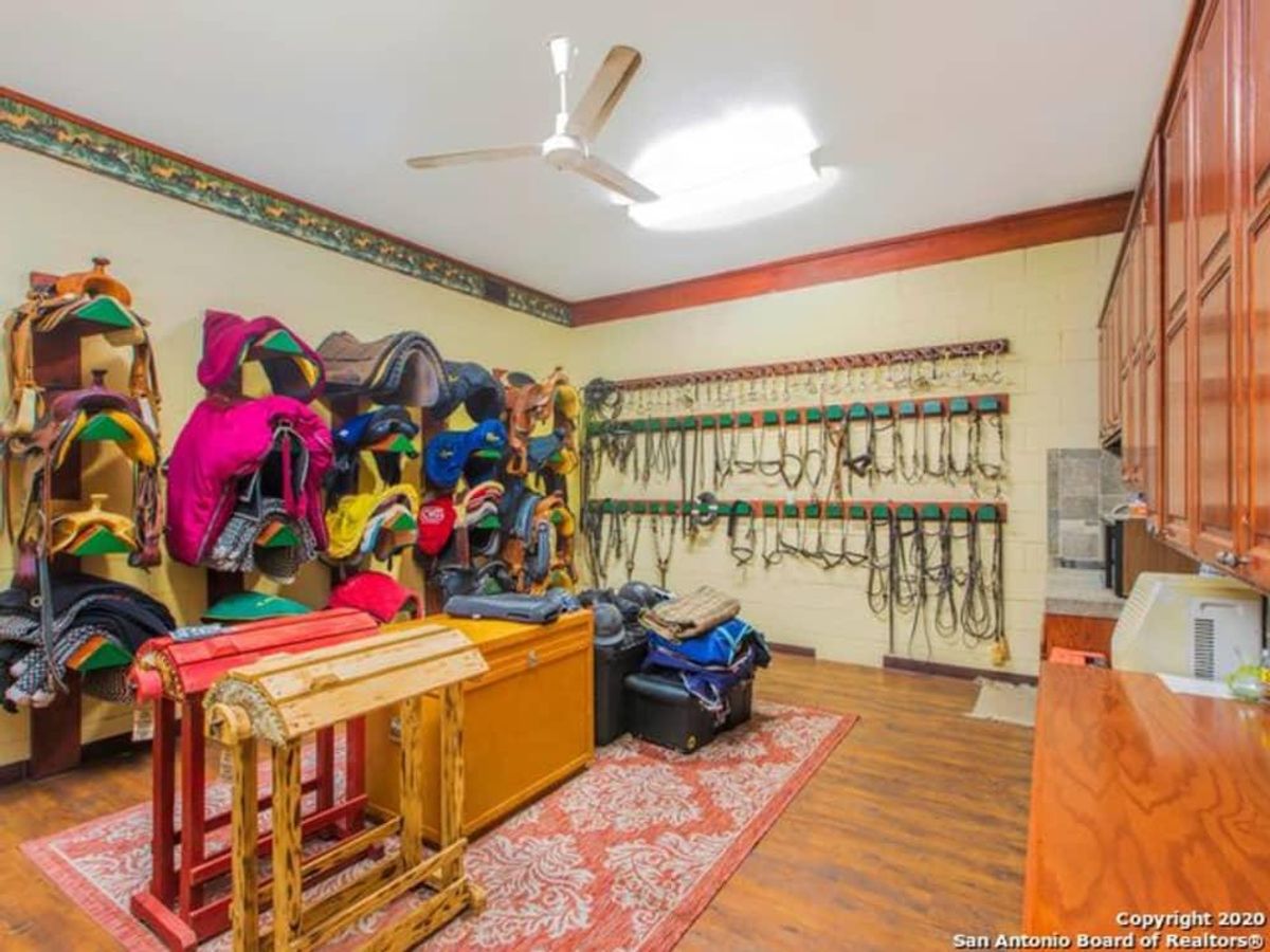 Once an Arabian horse farm, the property still has a 30-stall horse ...