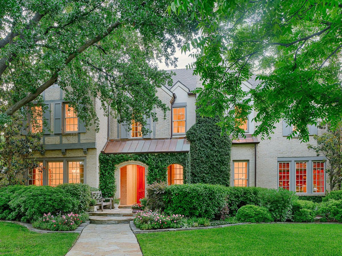 Gracious design, beautiful stonework and expert landscaping make the ...