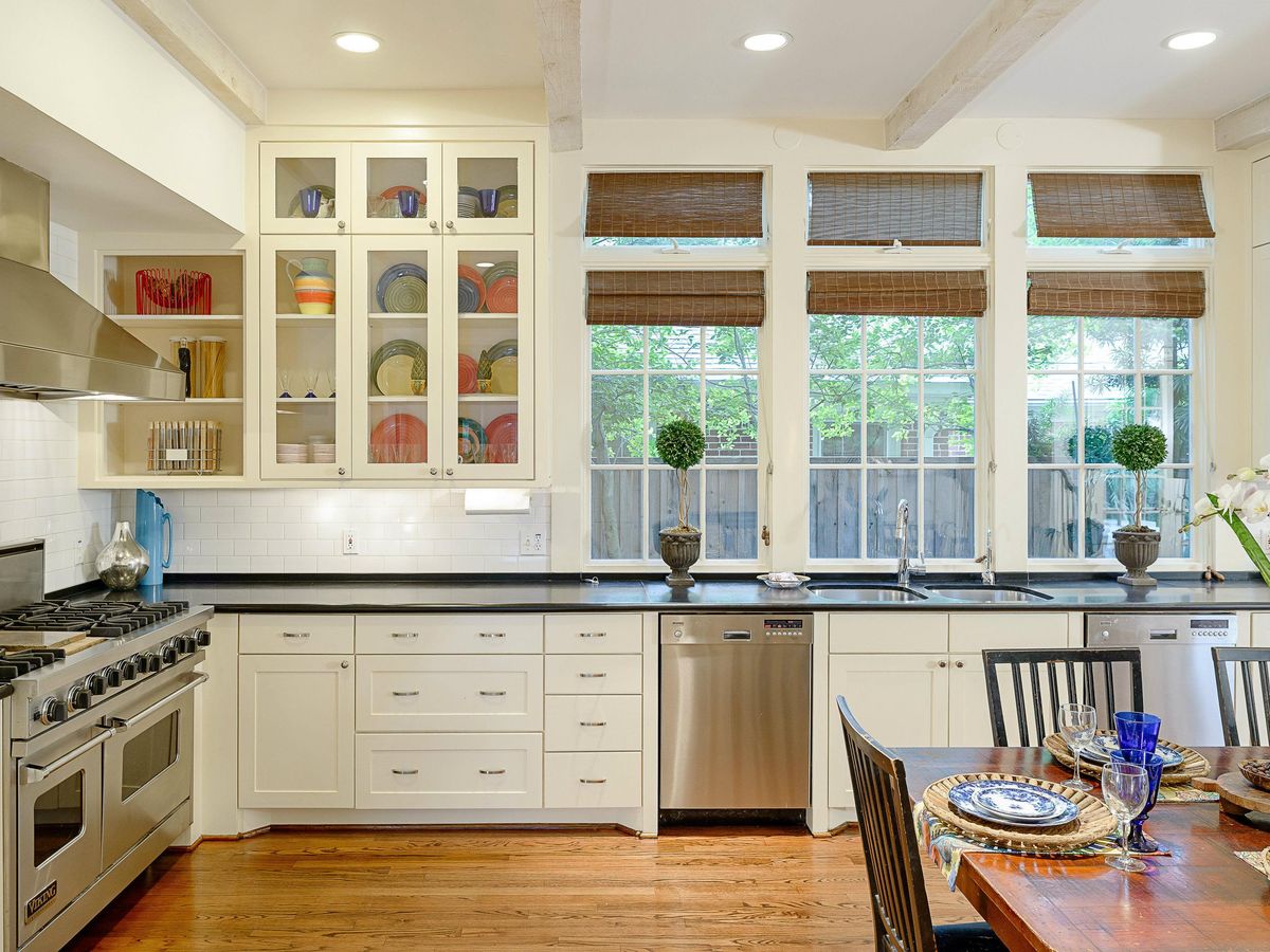 Gracious design, beautiful stonework and expert landscaping make the ...