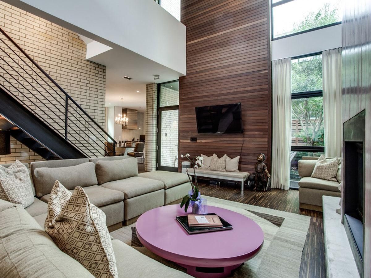 The living room in the swanky three-story townhome at 4321 Travis St ...