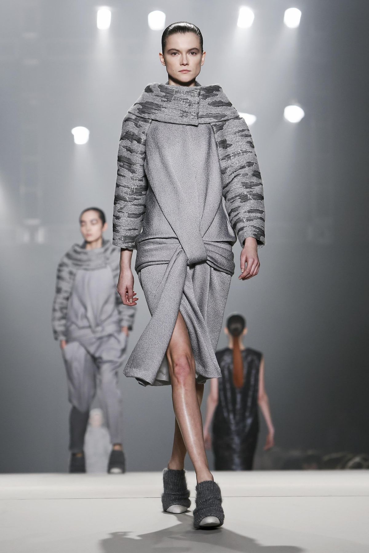 Alexander Wang showed cocoon-like silver coats. - CultureMap Dallas