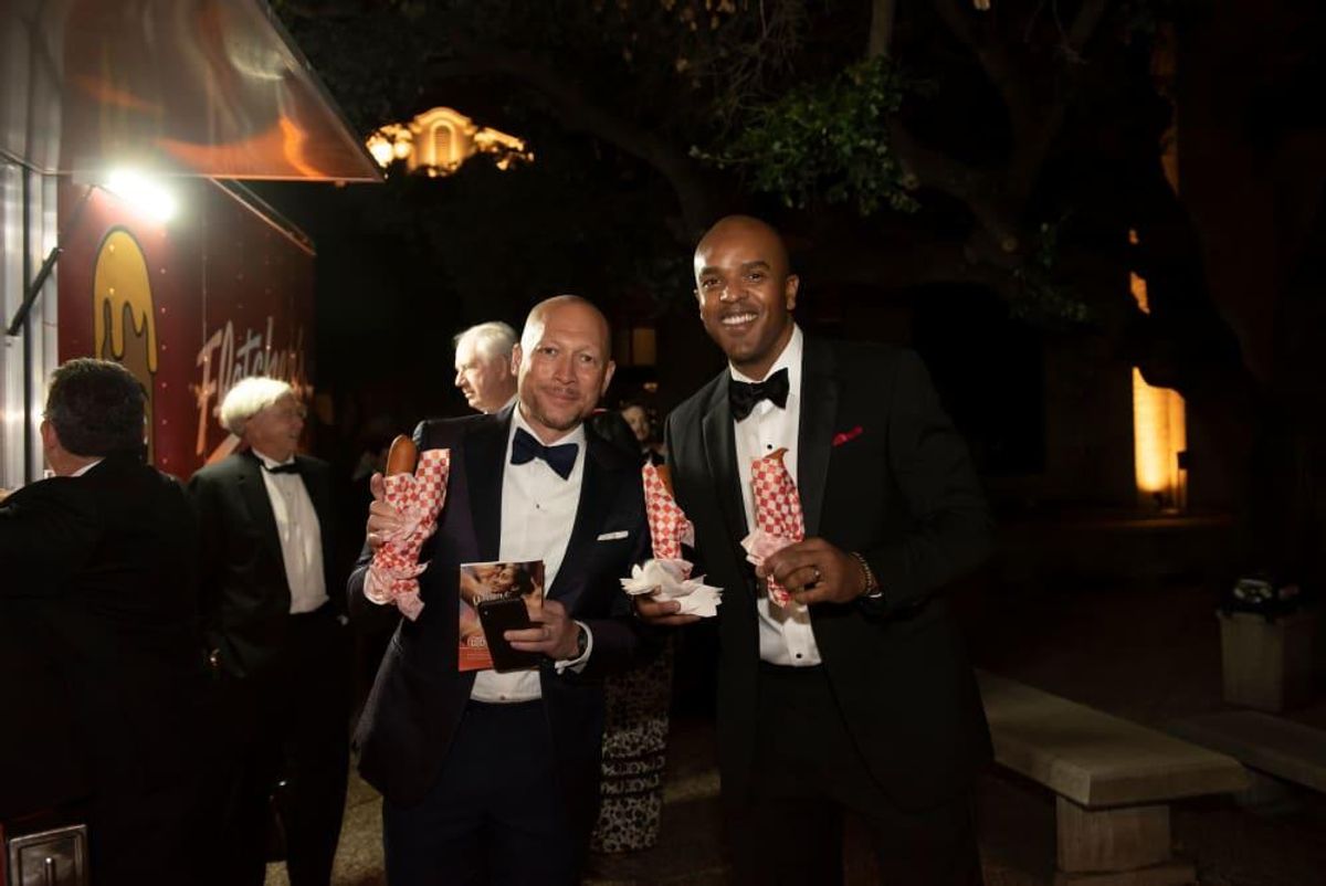 Anson Sobers and Jesse Abercrombie enjoy the Fletcher's Corny Dogs at ...