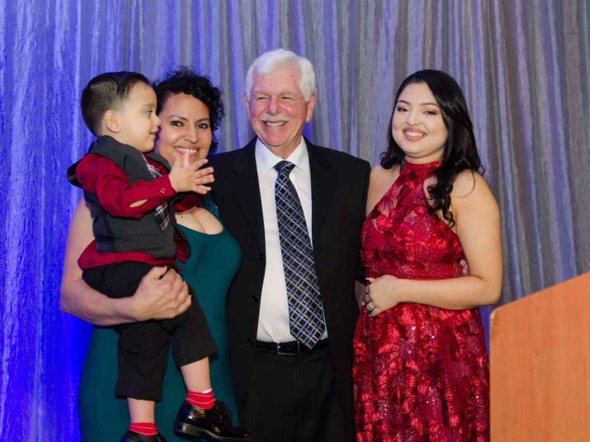 Dr. Richard Dickerman with Jessica Gutierrez (right), who received a ...