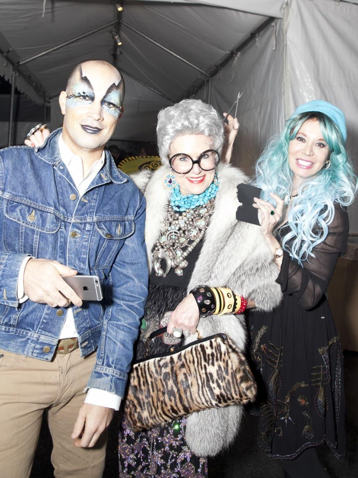 Co-chair Elaine Agather (center) dressed as Iris Apfel, with Brandon ...