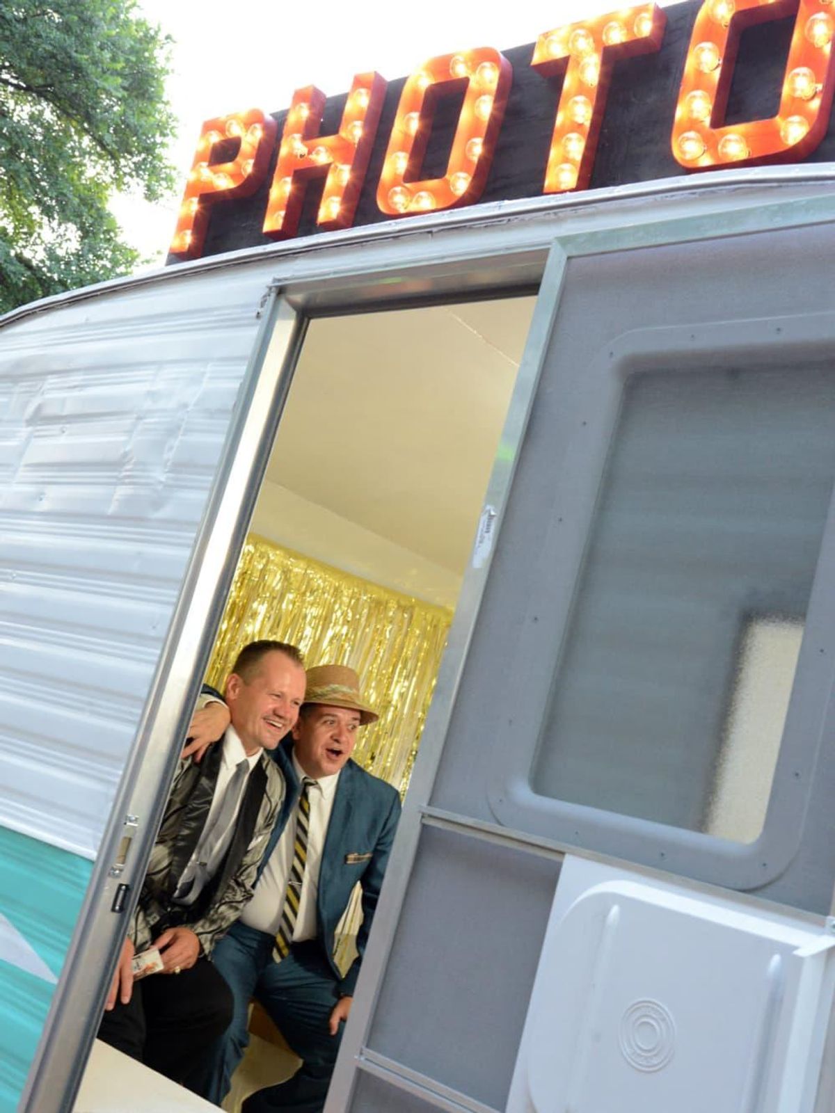 Carlos Cardova, Teddy Lewis in the photo booth. - CultureMap Dallas