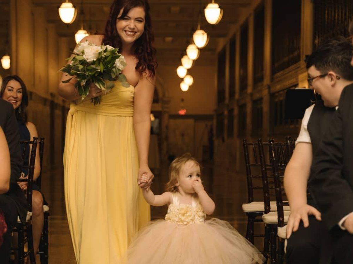 A rainstorm forced the the rooftop wedding to relocate to a historic ...