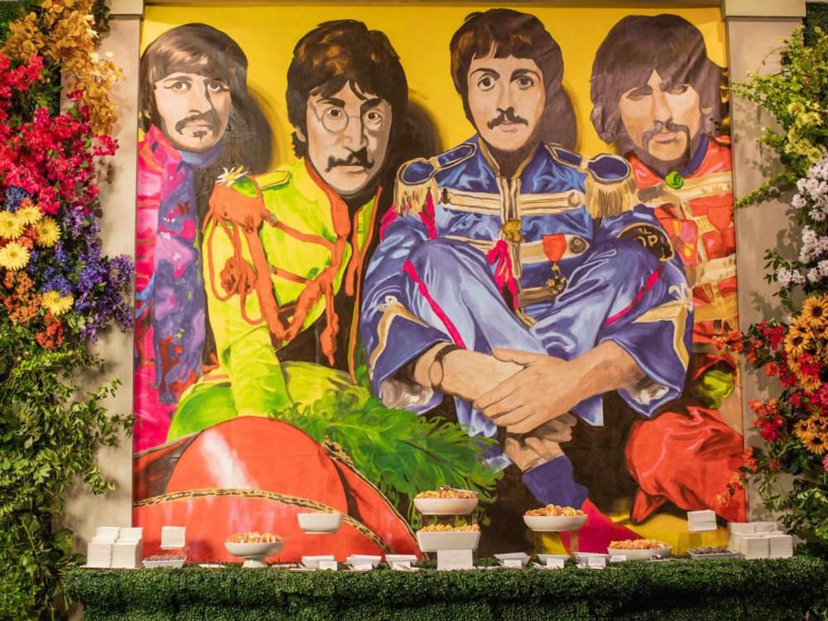 A Beatles mural made for a spectacular backdrop for a food display and ...