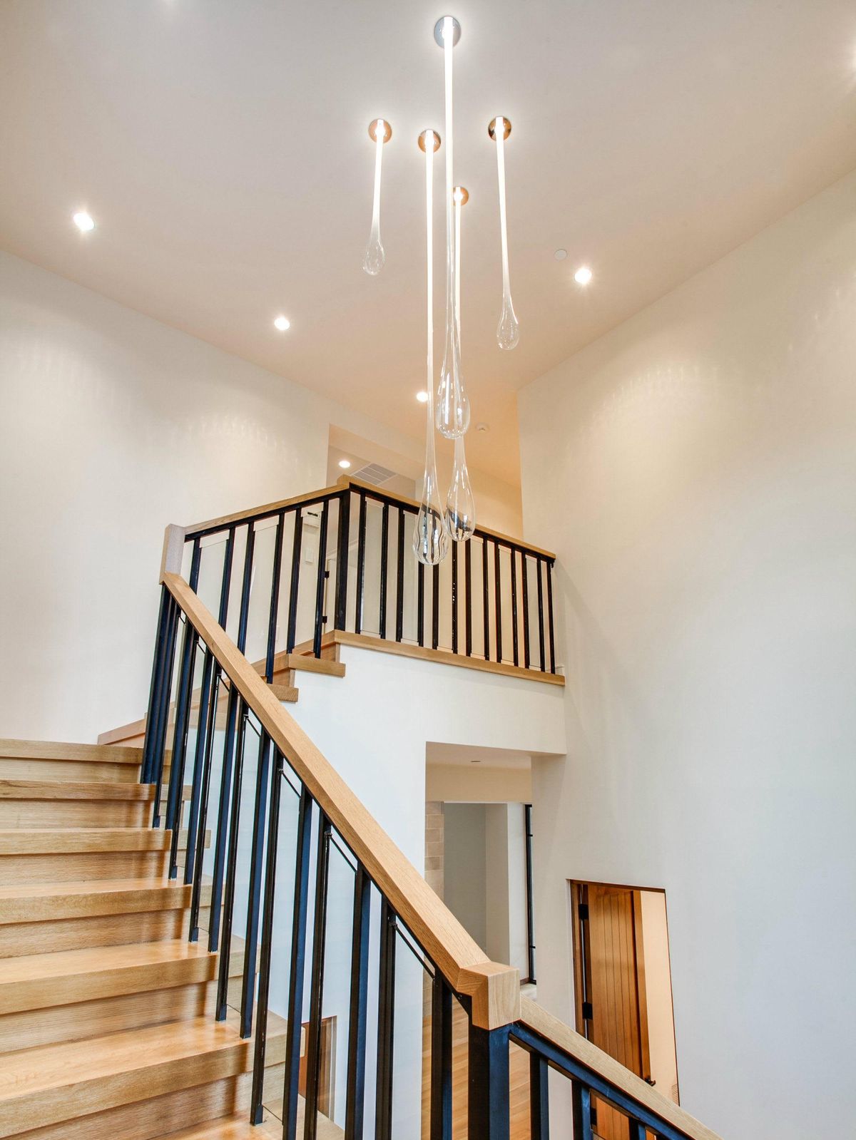 A dramatic light fixture adds impact. - CultureMap Dallas