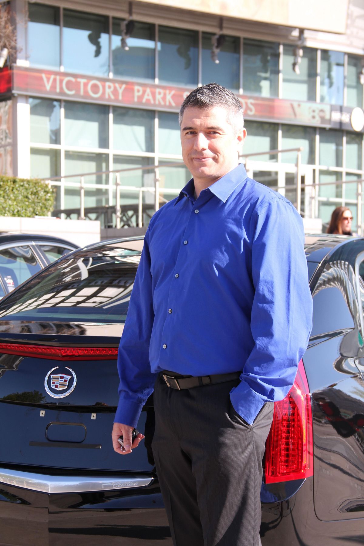 Dietmar Lambertz of Dallas with his new Cadillac. - CultureMap Dallas