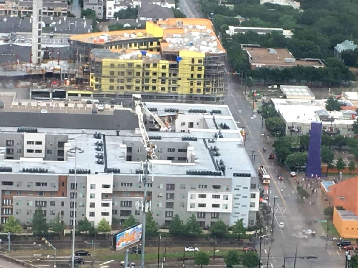 Elan City Lights building with collapsed crane. - CultureMap Dallas