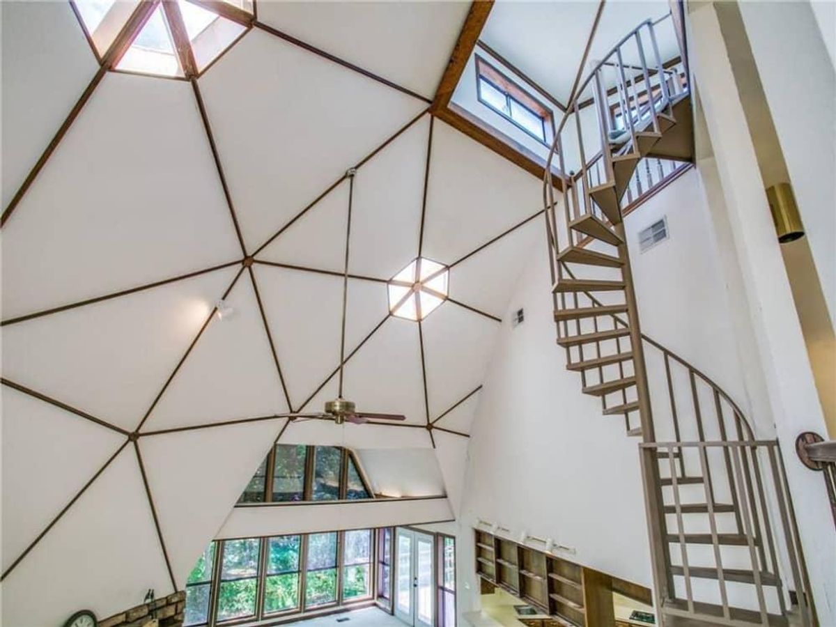 The dome theme is even more prevalent inside, where geometric lines ...