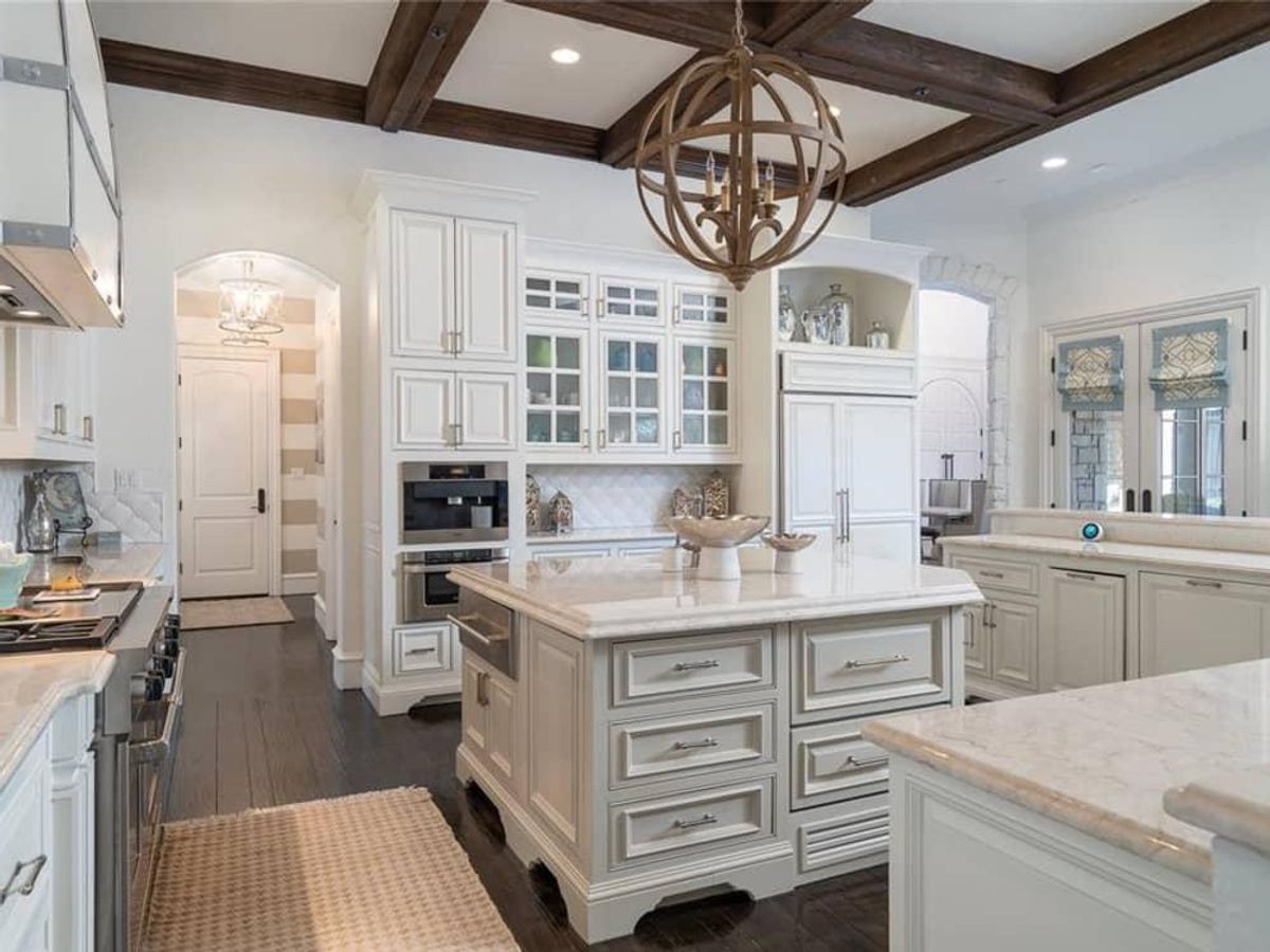 The large chef's kitchen is perfect for entertaining the whole team ...