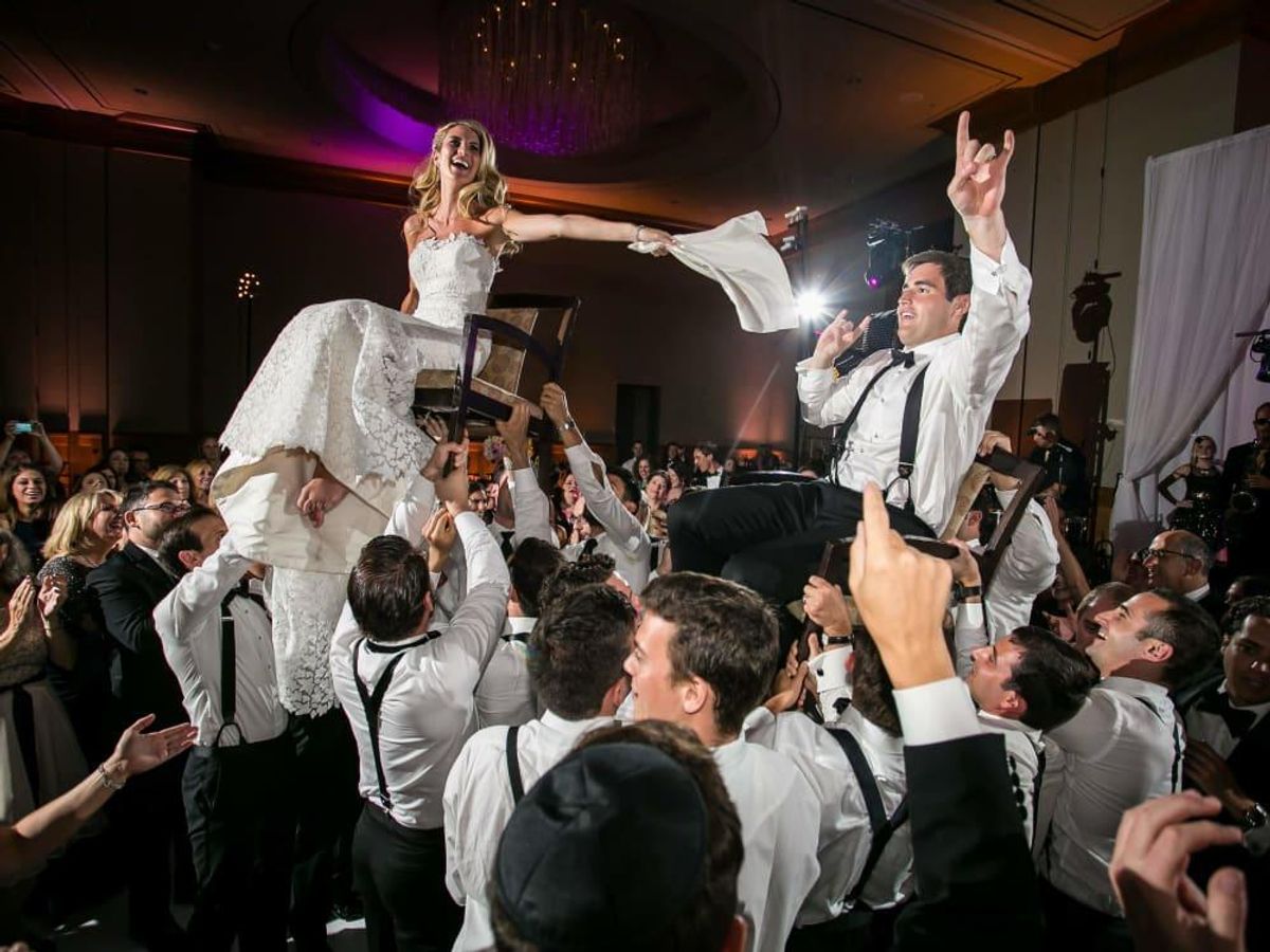 No Jewish wedding is complete without the Hora. - CultureMap Dallas