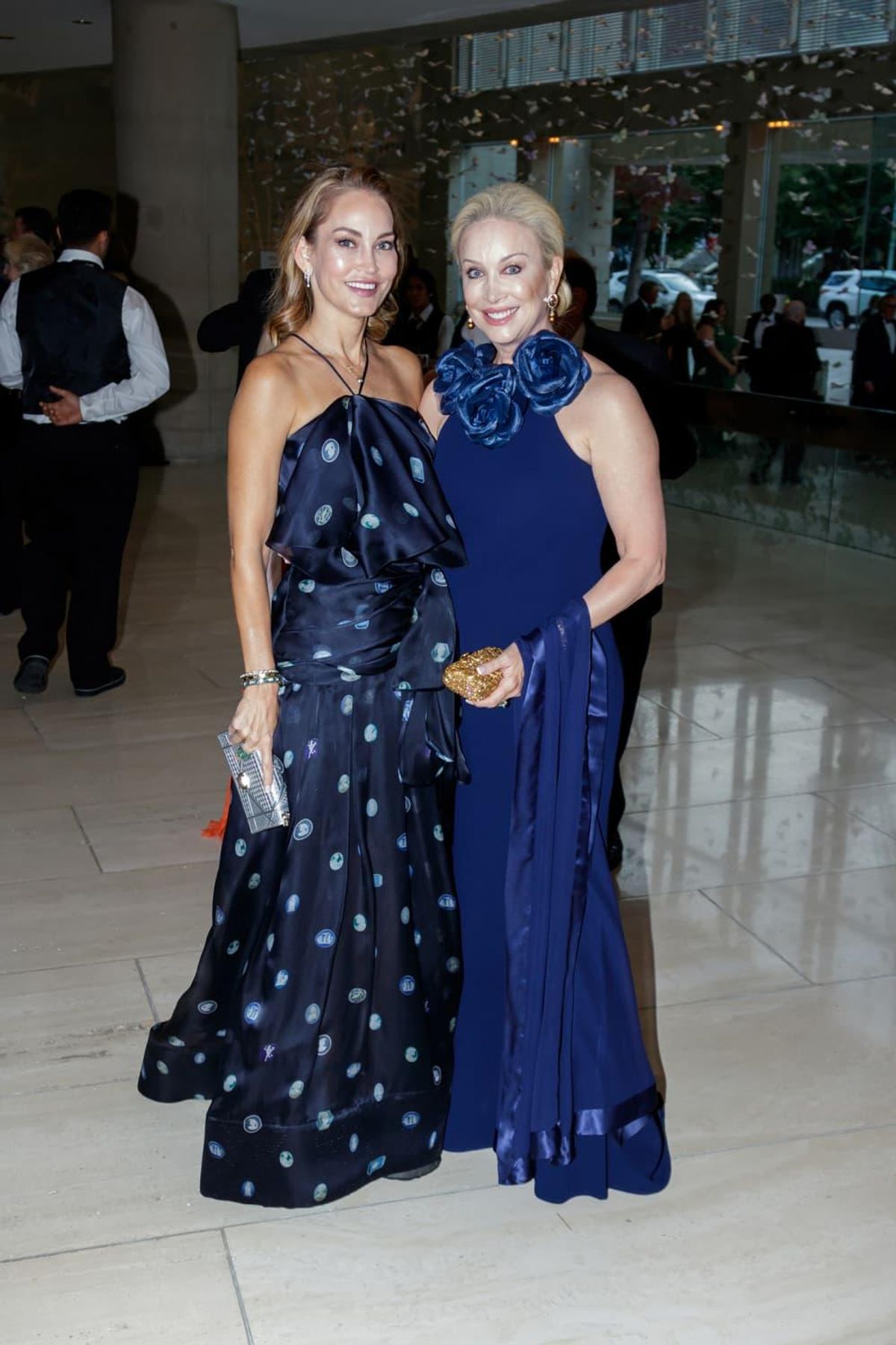 Kara Goss in Rosie Assoulin, Kim Hext in Calvin Klein - CultureMap Dallas