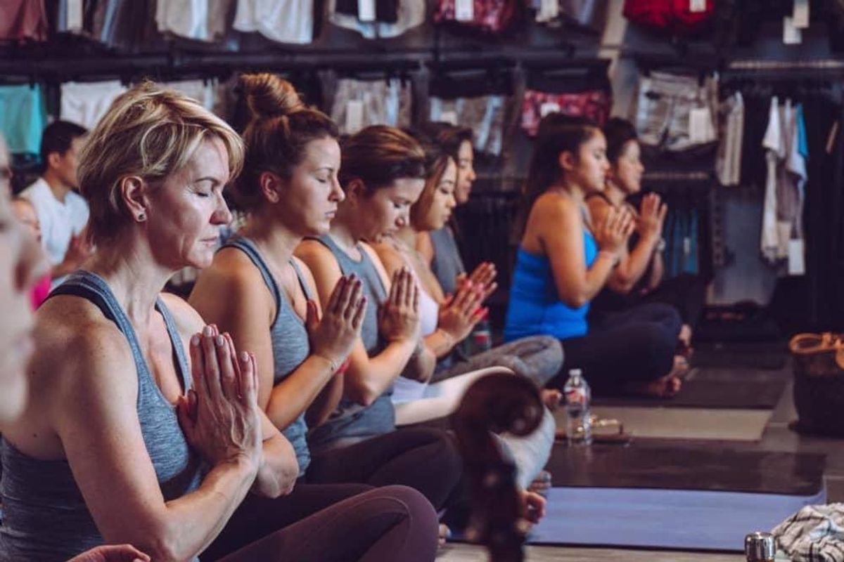 Lululemon often hosts yoga classes. - CultureMap Dallas