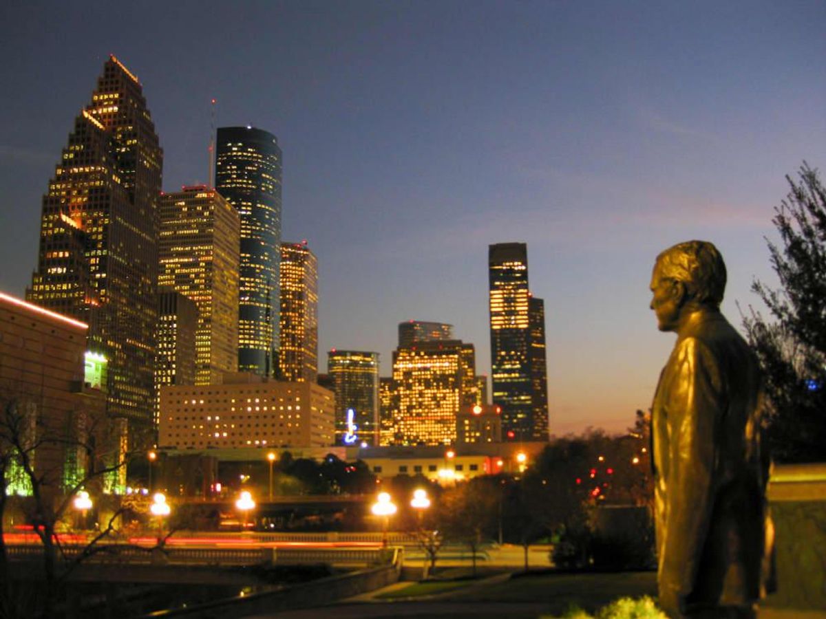 A statute of George H.W. Bush overlooks downtown Houston. - CultureMap ...