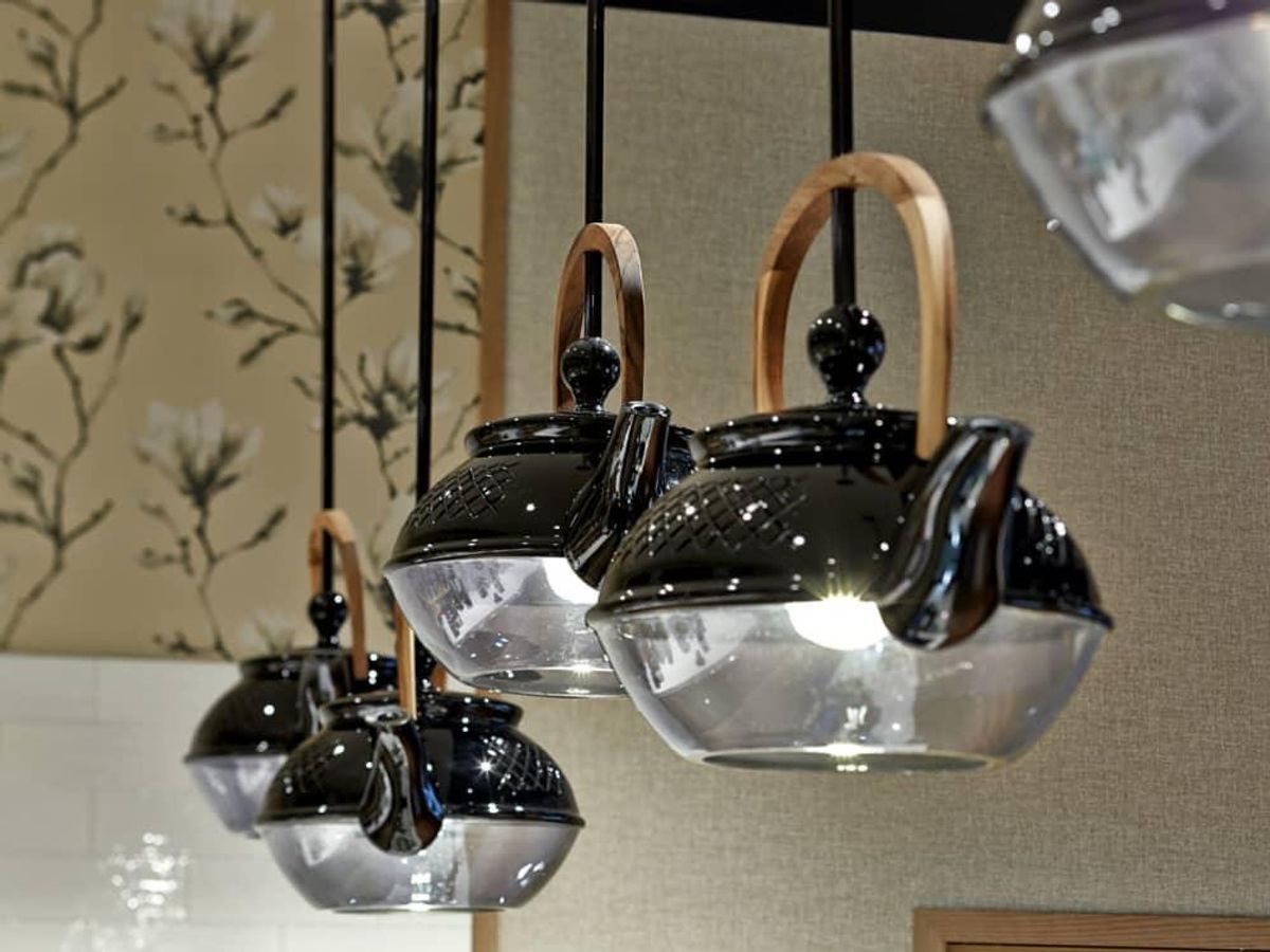 Lights at Texas Tea House are made from tea kettles. - CultureMap Dallas