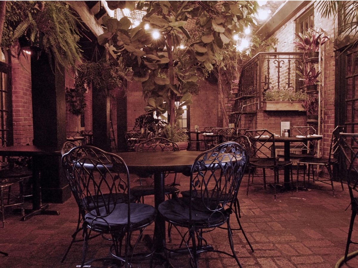 The Quarter Bar's courtyard is something right out of New Orleans ...