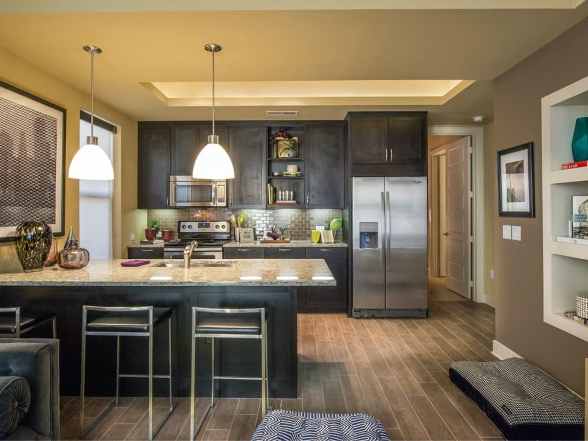 Gourmet kitchen is only one designer touch. - CultureMap Dallas