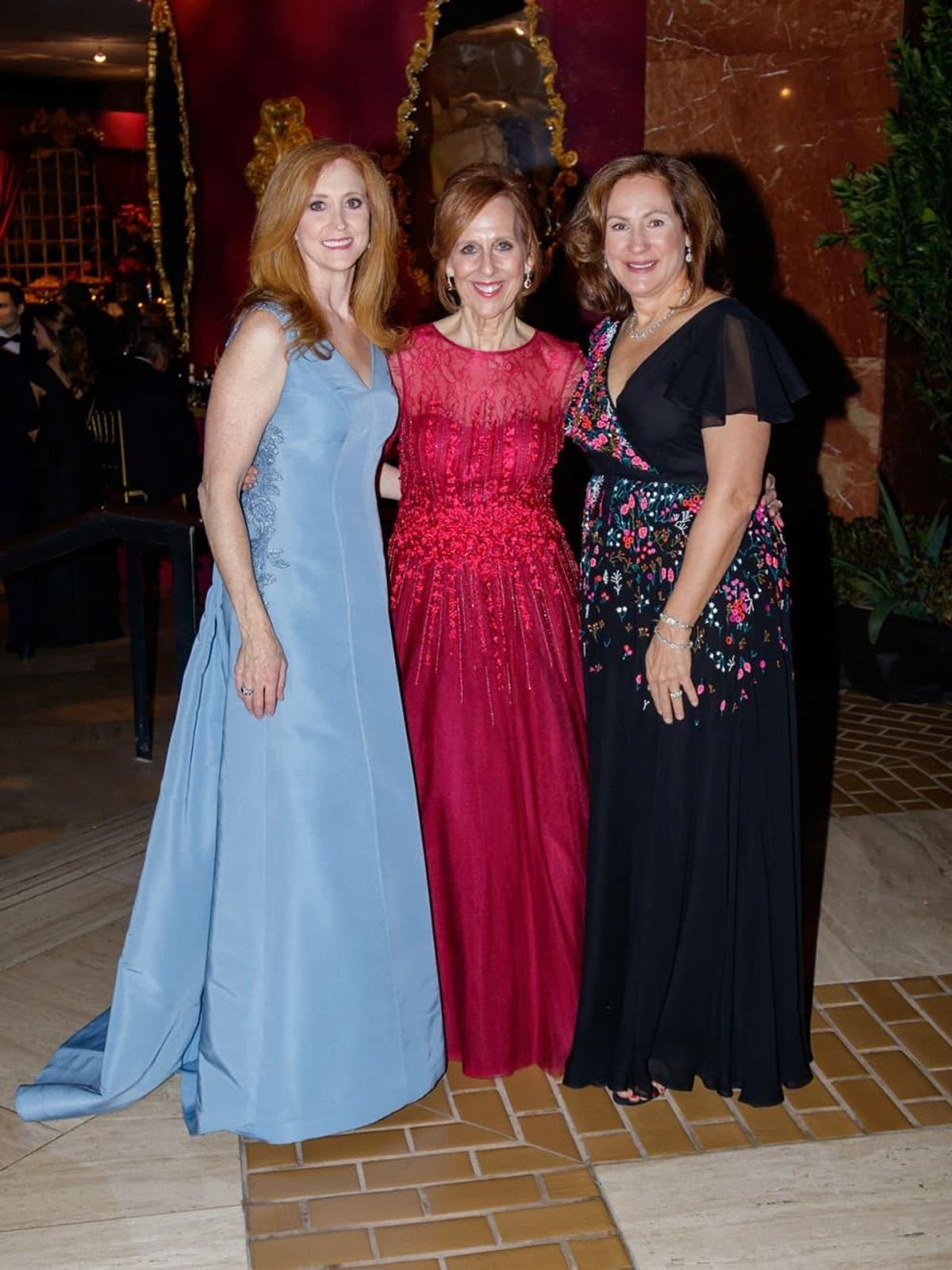 Susan Farris (center, with Tiffany Divis and Tucker Enthoven) is ...