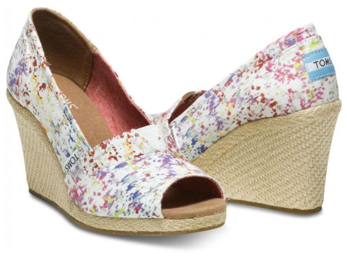 We love Toms comfy wedges in this cheerful paint-splatter print. ($68. ...